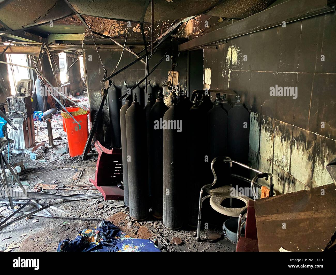 Burned oxygen cylinders are seen in the intensive care unit of the Ibn ...