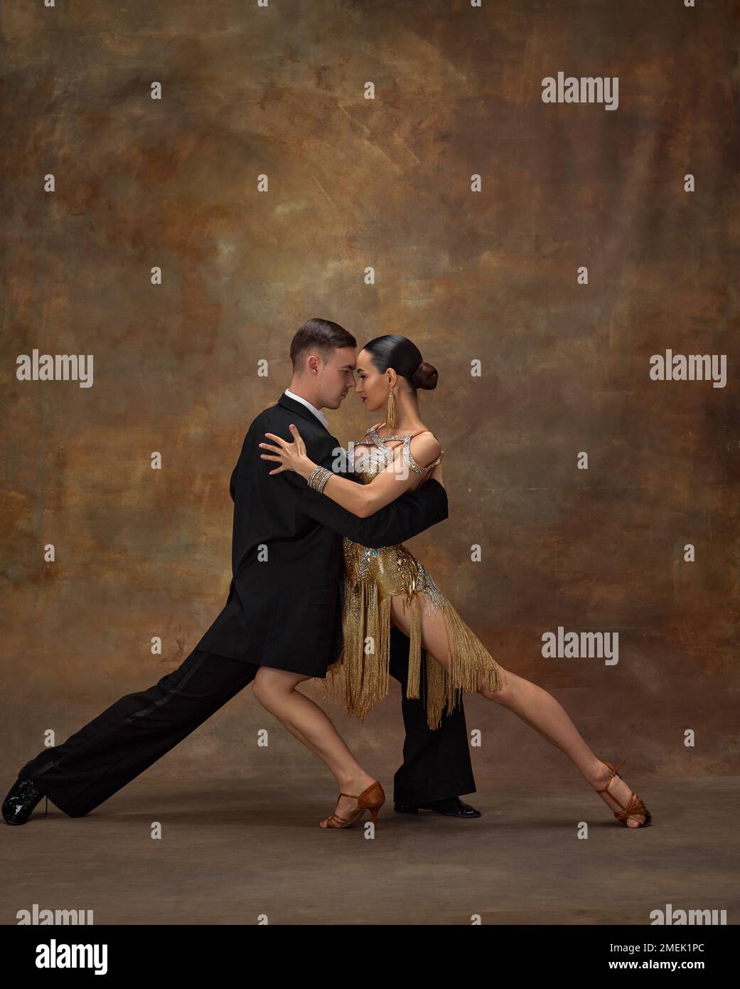 Passionate couple dancing. Man and woman, professional dancers ...