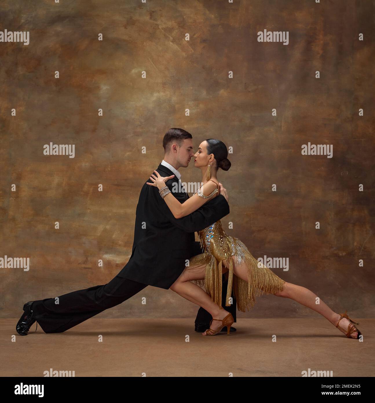 Romance and passion. Man and woman, professional tango dancers in ...
