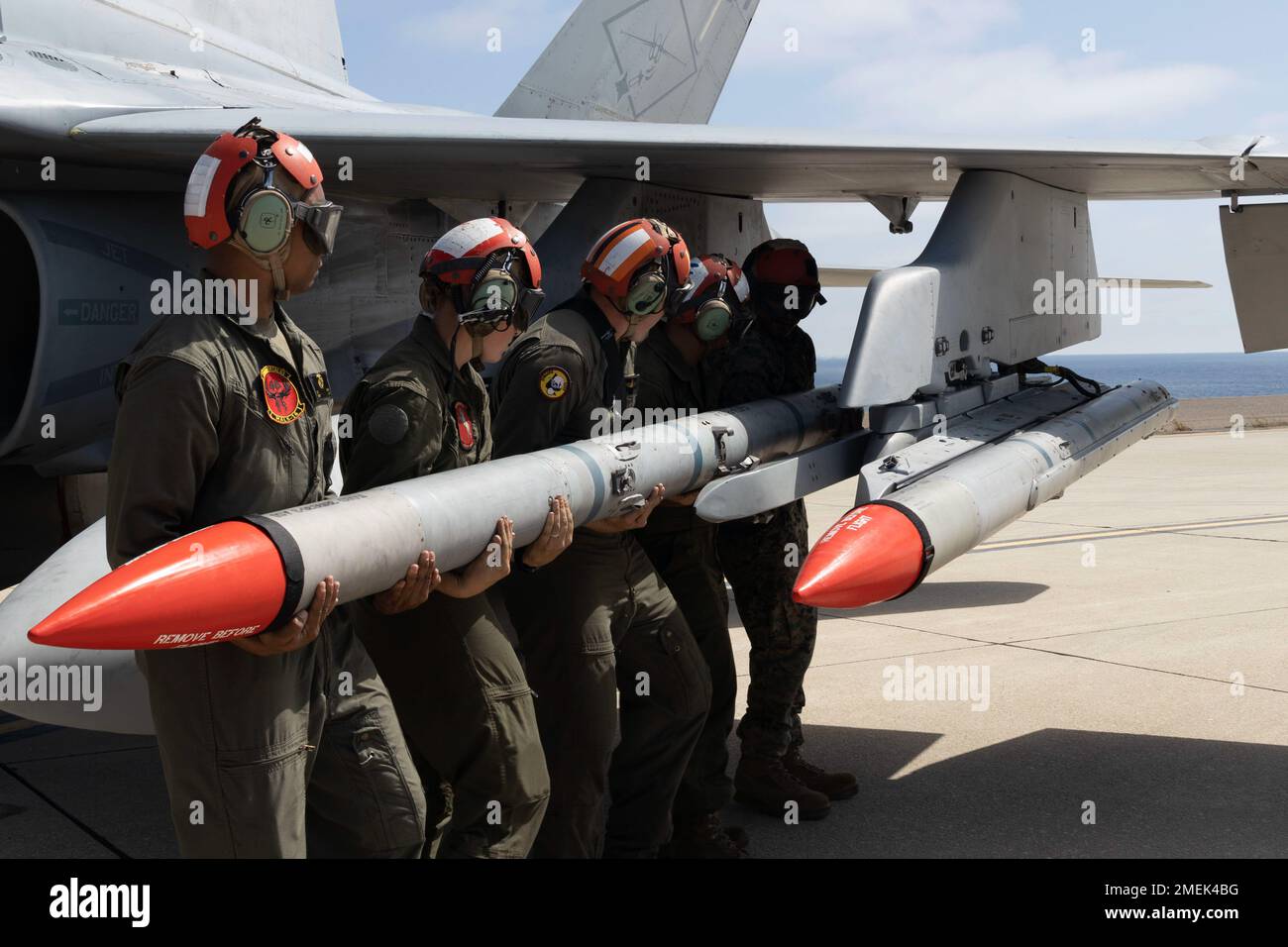 U.S. Marines from squadrons across 3rd Marine Aircraft Wing load a CATM ...