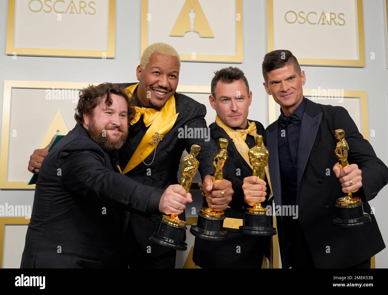 Michael Govier, from left, and Will McCormack, from right, pose with ...