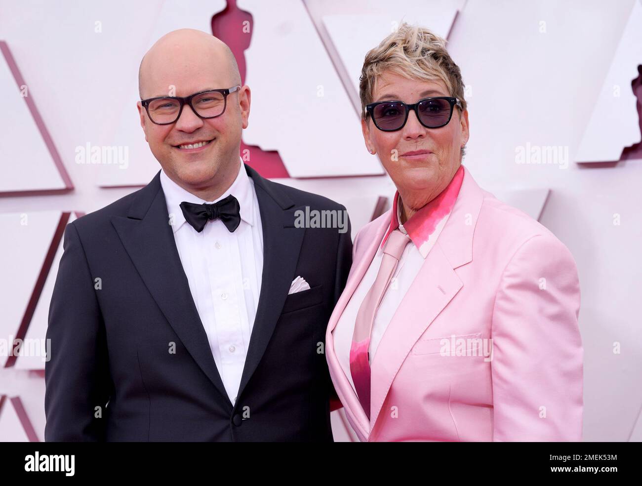 Dan Scanlon, left, and Kori Rae arrive at the Oscars on Sunday, April ...