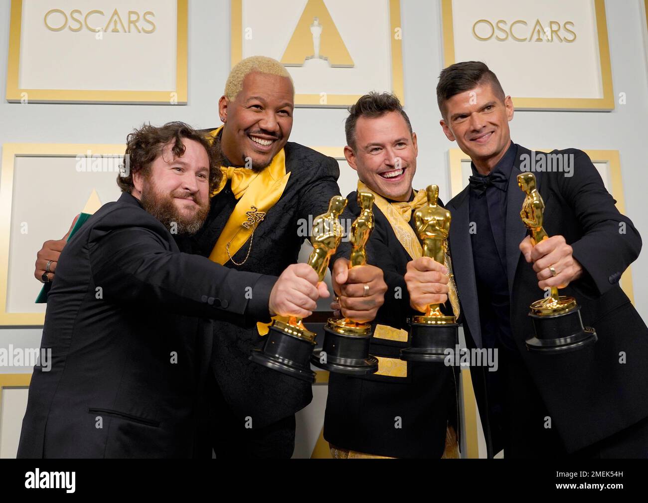 Michael Govier, from left, and Will McCormack, from right, pose with ...