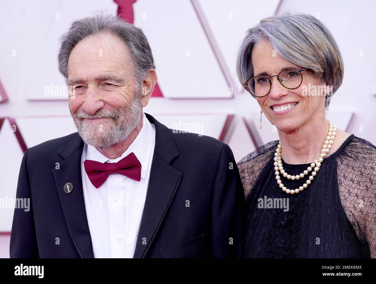 Eric Roth, left, and Debra Greenfield arrive at the Oscars on Sunday ...