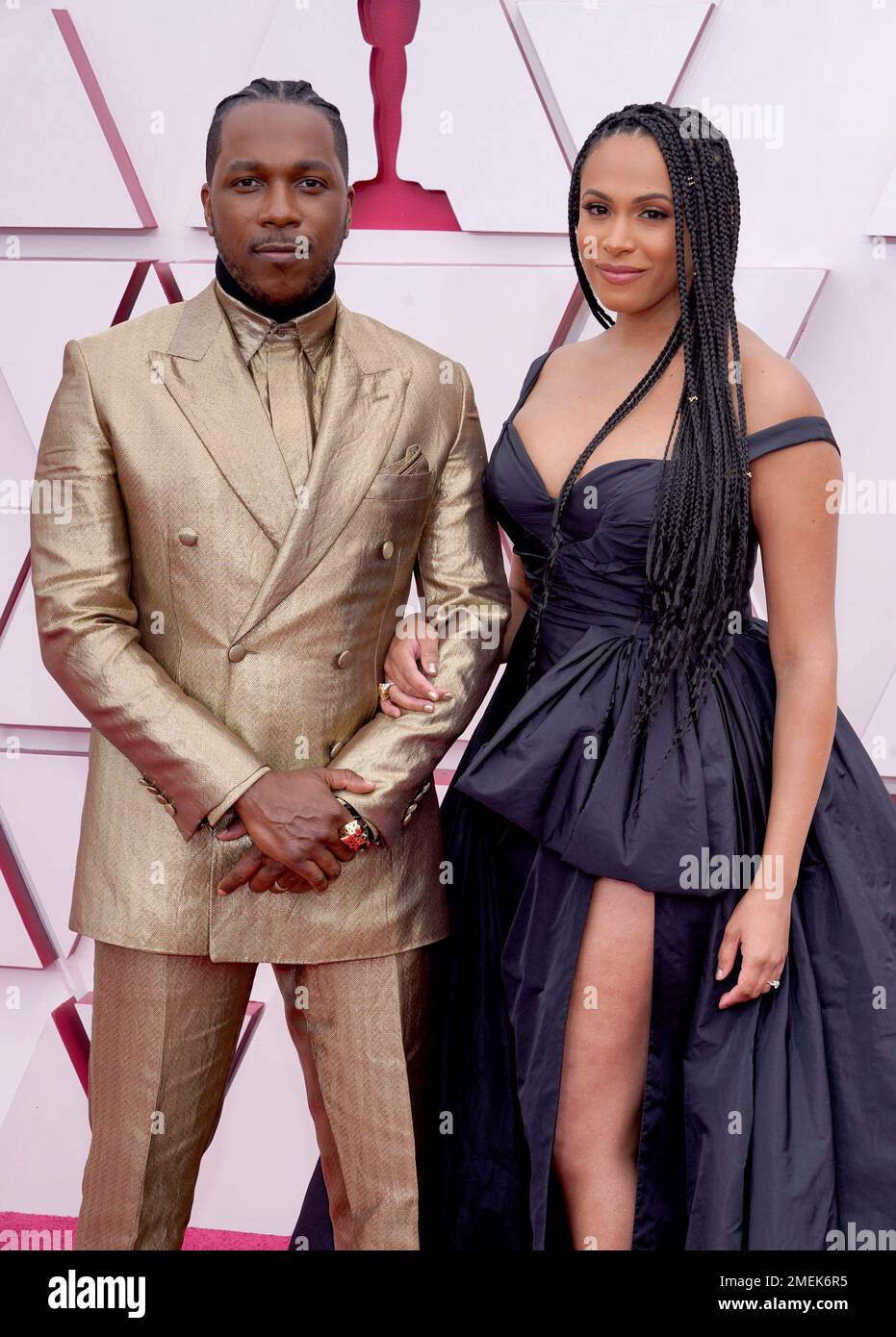 Leslie Odom Jr., left, and Nicolette Robinson arrive at the Oscars on ...