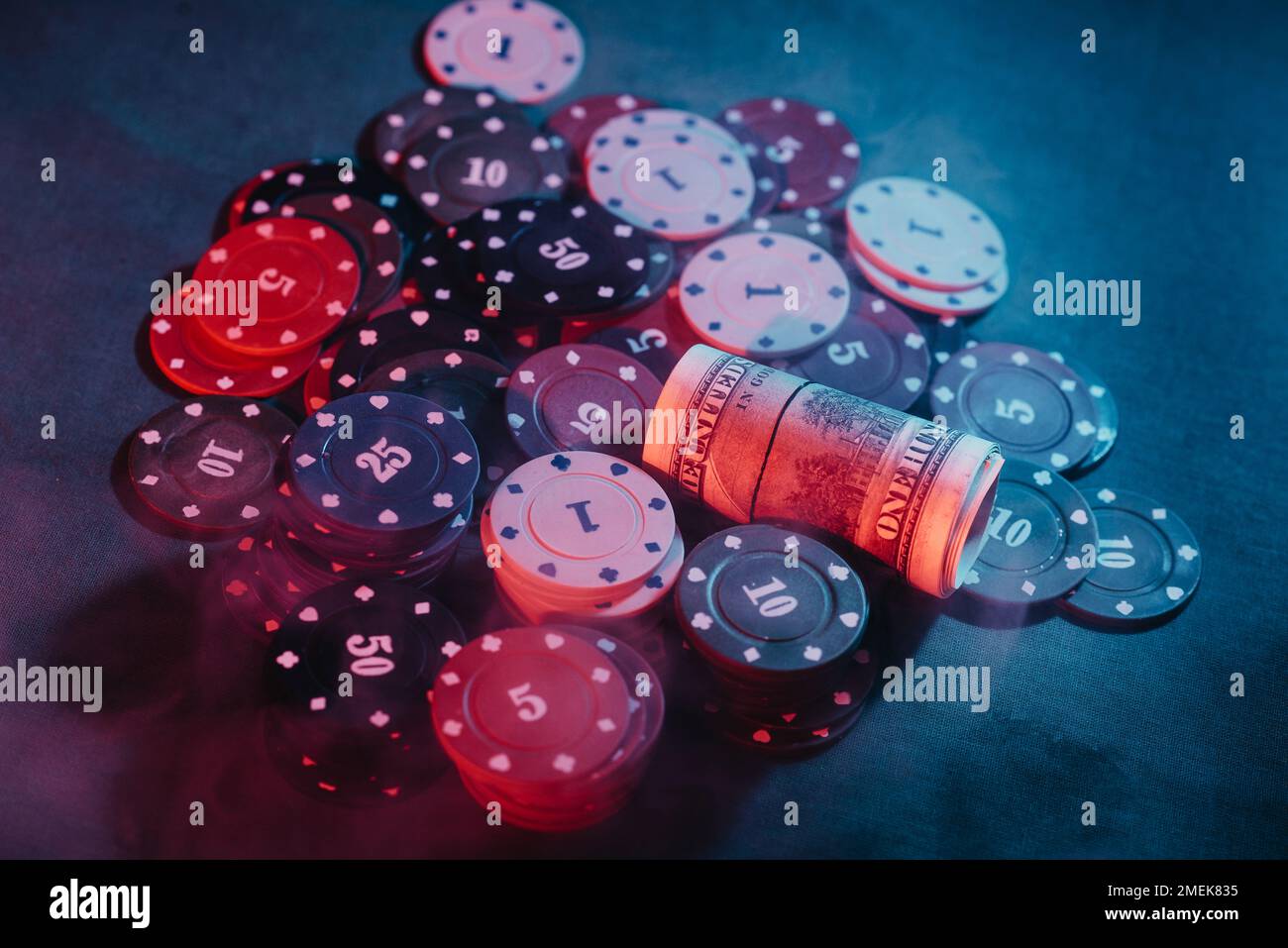 poker. playing chips, money placed bet. close up. puffed smoke in the ...