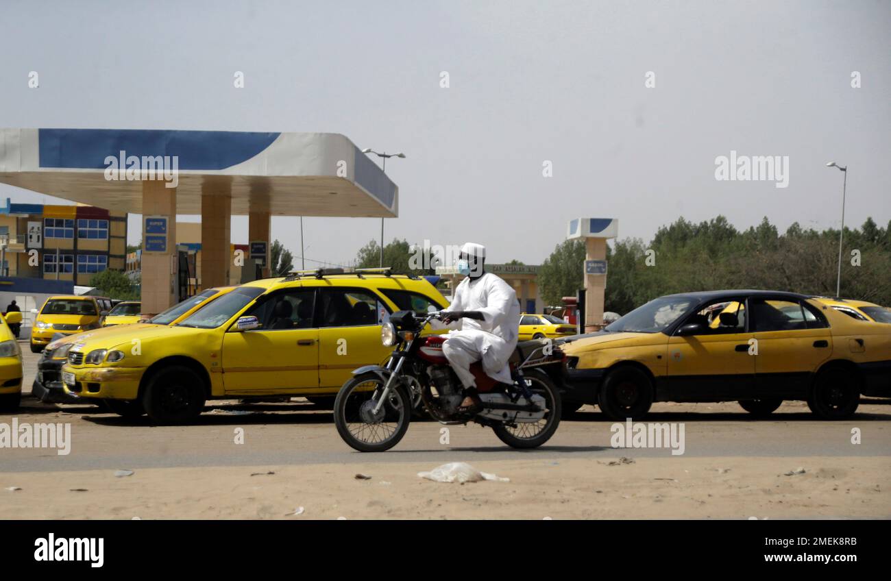 A Chadian man ride a motor bike on the street in N'Djamena, Chad, Sunday, April 25, 2021. (AP ...