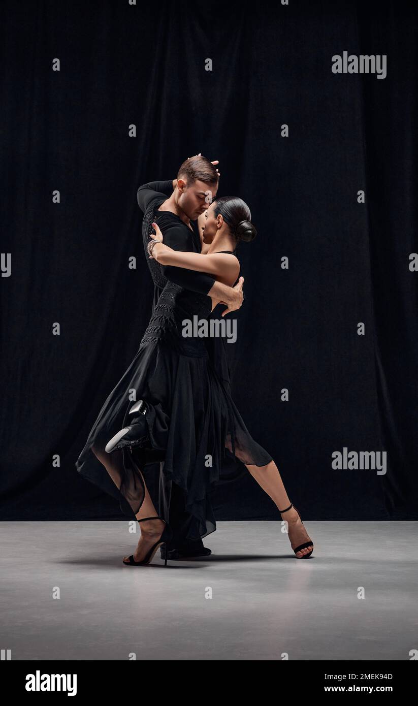 Traditional choreography. Man and woman, professional tango dancers ...