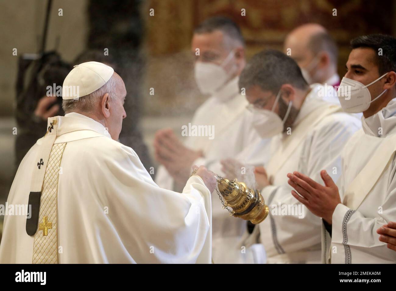 Pope Francis spreads incense during a ceremony to ordain nine new ...