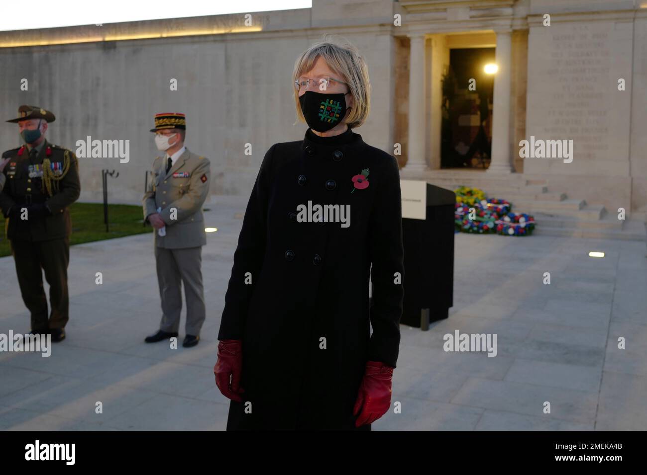 Australia's Ambassador to France Gillian Bird stands after a wreath ...