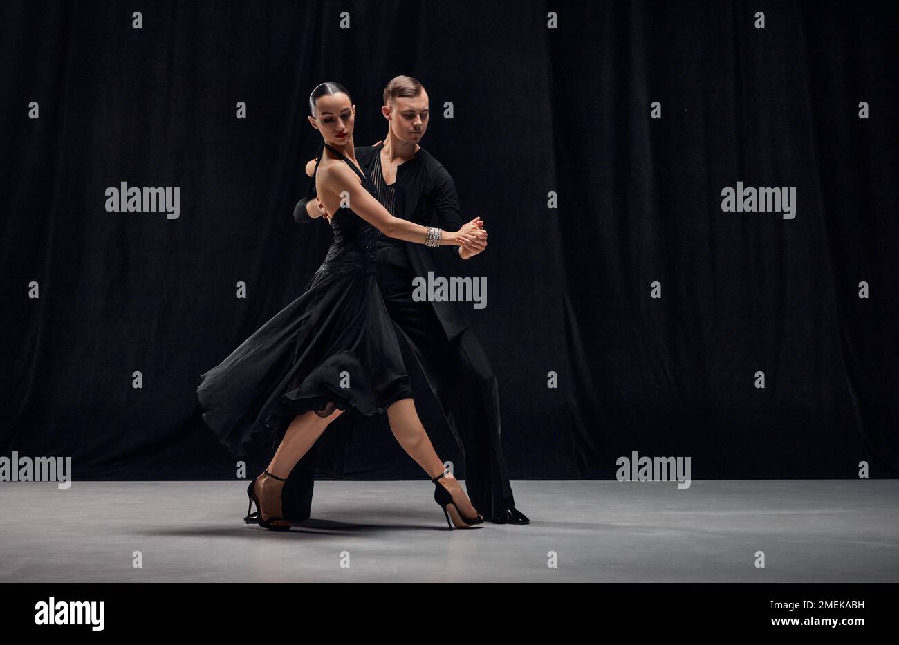 Impressive passionate performance. Man and woman, professional tango ...
