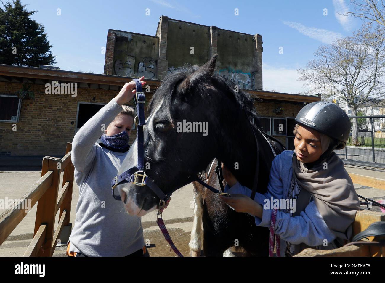Tasneem Aly, right, and General manager Naomi Howgate take the harness ...
