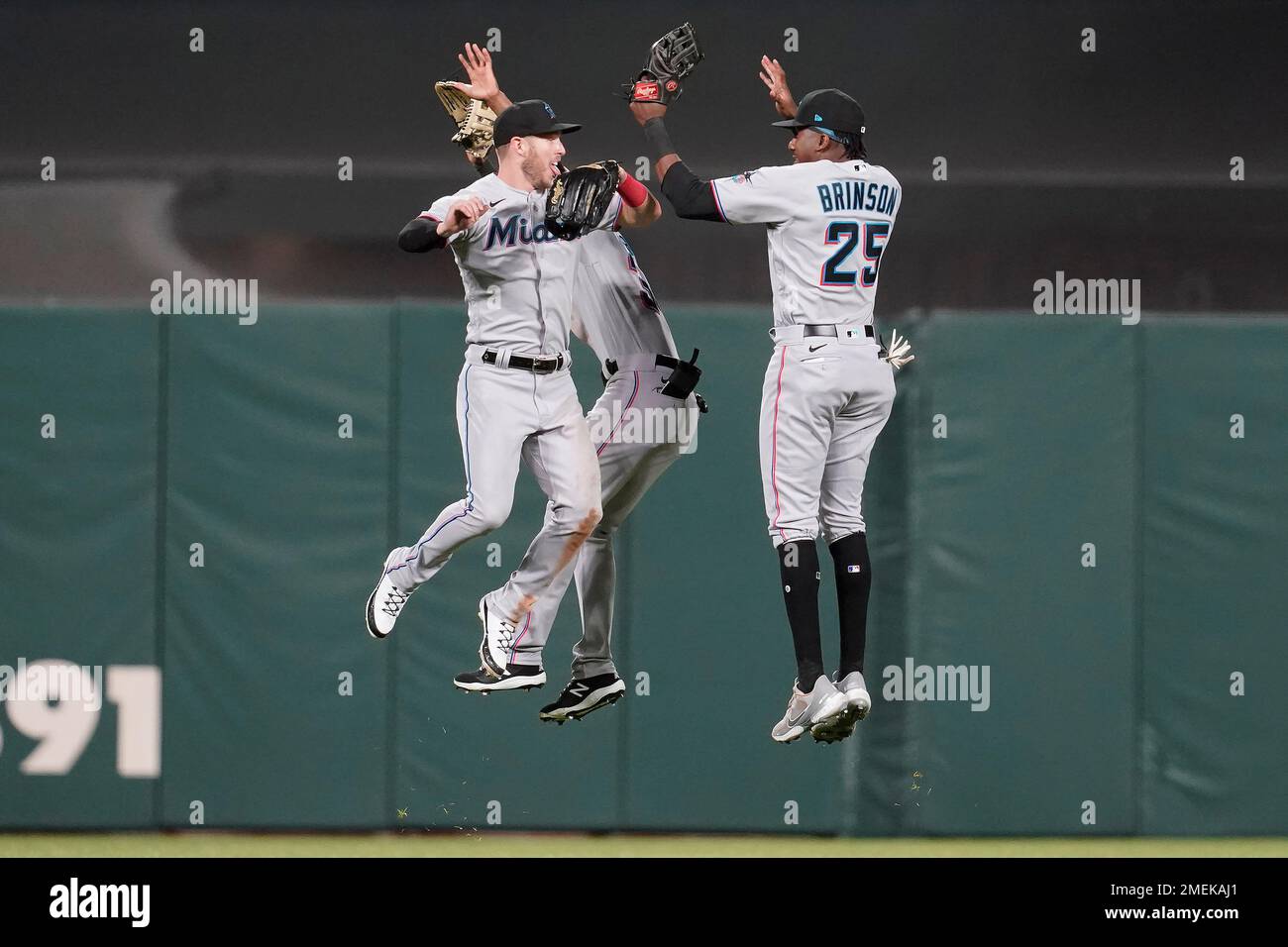 Miami Marlins' Corey Dickerson, from left, celebrates with Magneuris ...
