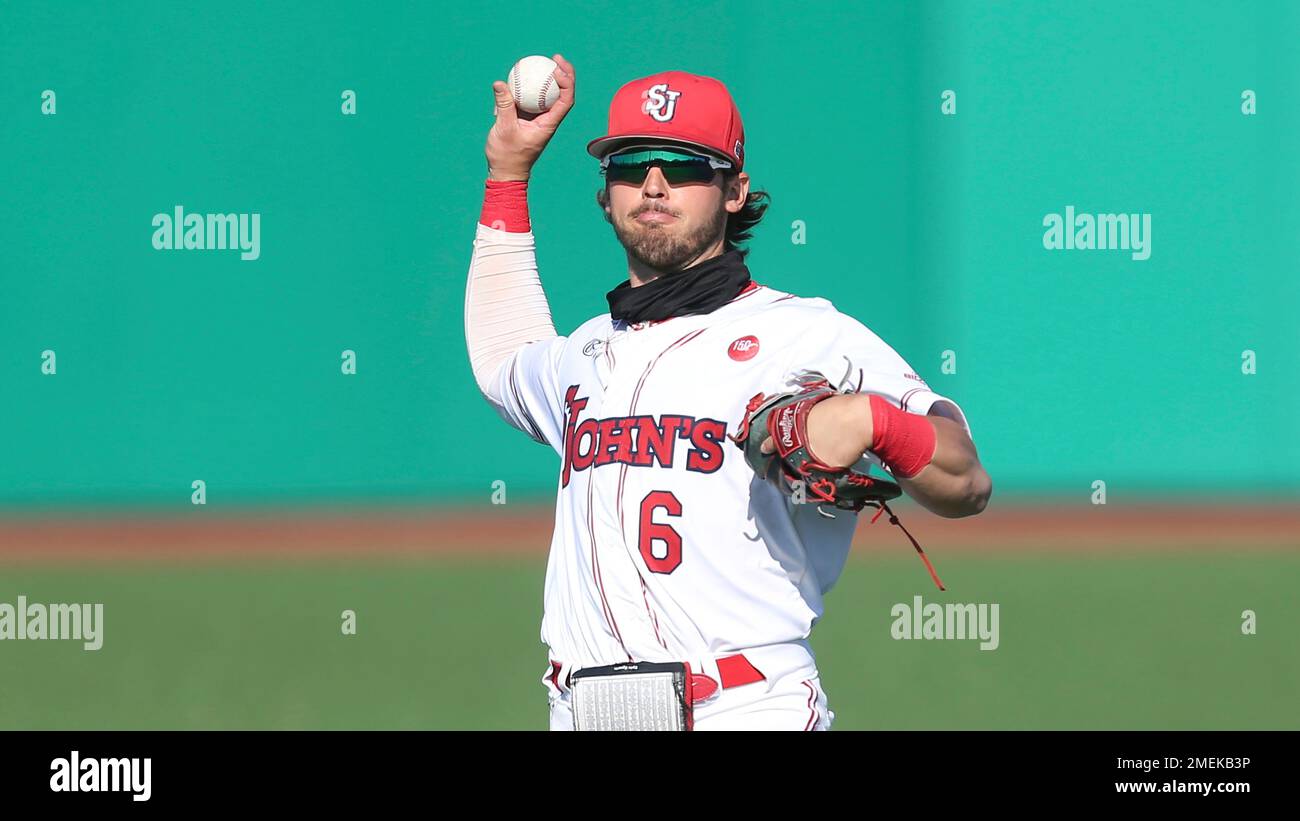St. John's Ryan Hogan throws during an NCAA baseball game against Seton ...