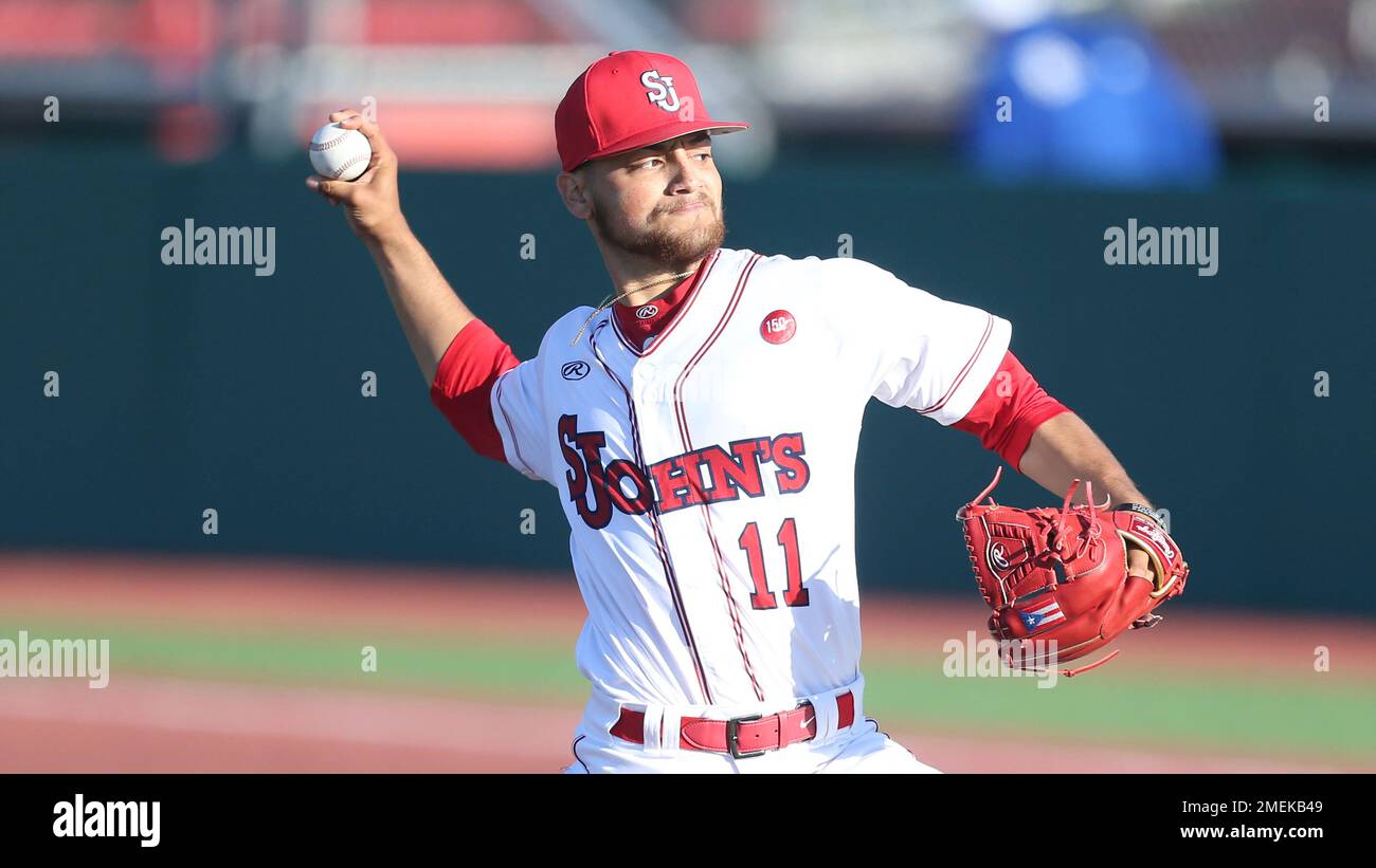 St. John's (NY) pitcher Jose Rodriguez (11) throws during an NCAA ...