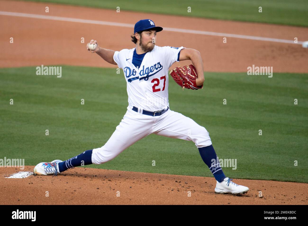 Los Angeles Dodgers starting pitcher Trevor Bauer winds up during the ...