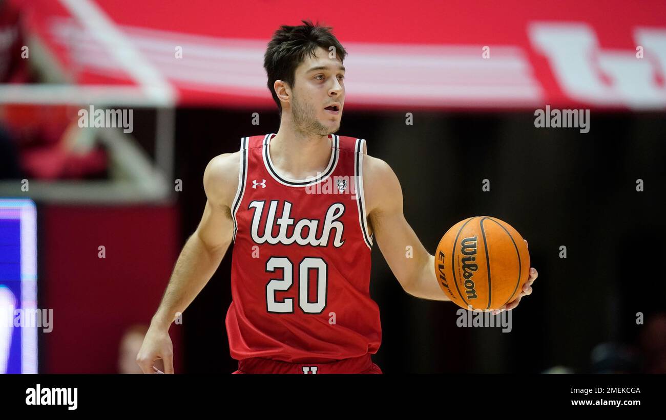 Utah guard Lazar Stefanovic (20) brings the ball cup court during the ...