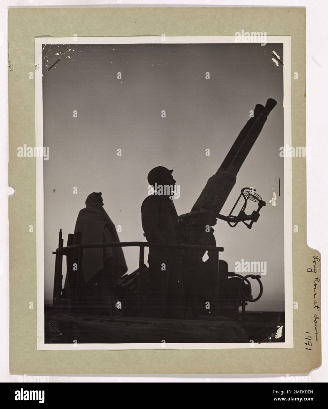 Coast Guardsmen stand vigilant on gun watch as the hour of invasion ...