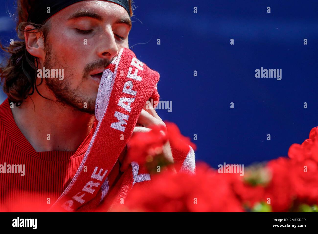 Stefanos Tsitsipas of Greece wipes his face during a semi final Godo ...