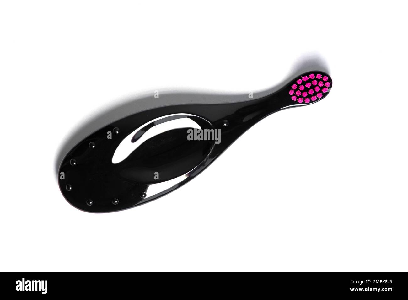 First baby toothbrush isolated on white background.Pink color kids ...