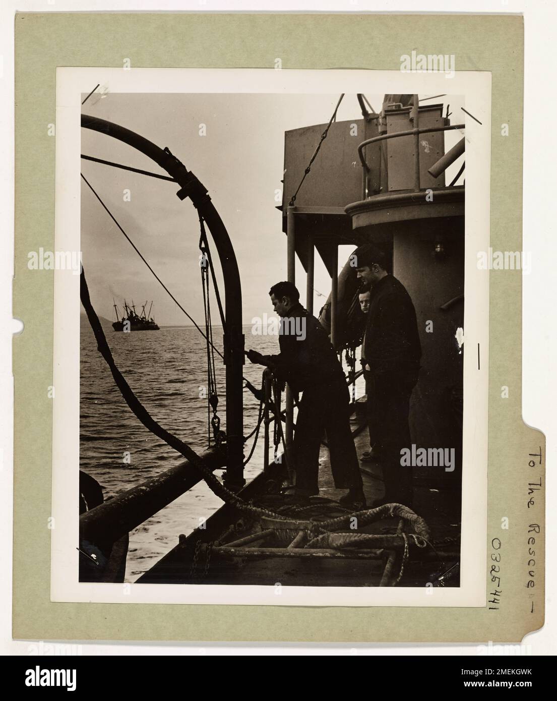 A Coast Guard combat cutter responds to a distress call from a merchant ...