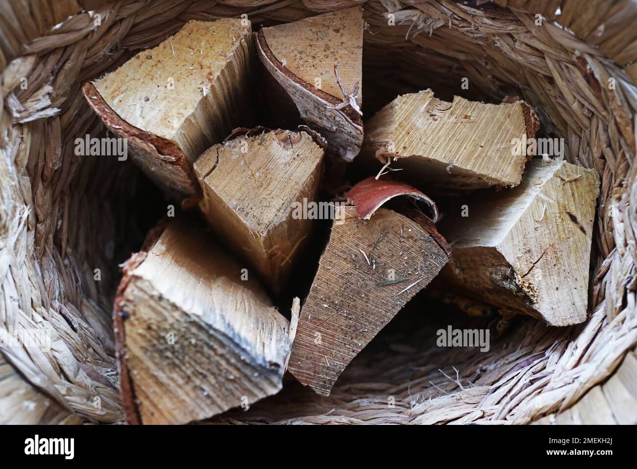 Firewood at a fire place in a home for heating the house Stock Photo ...