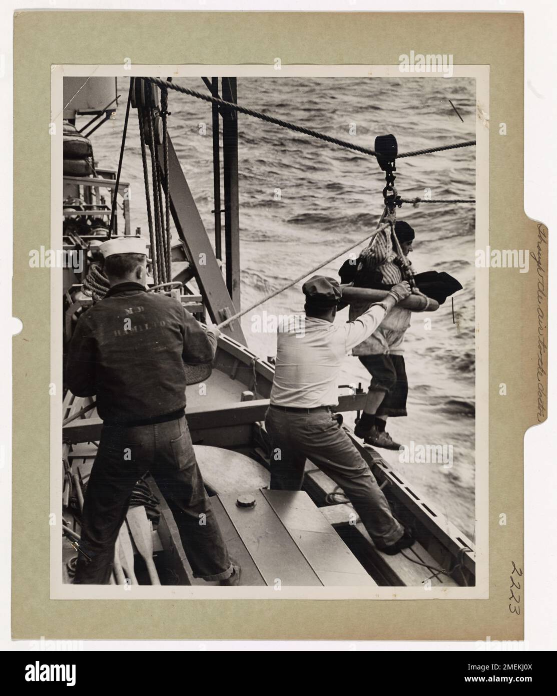 A seaman ill aboard a merchant vessel is transferred to a Coast Guard ...