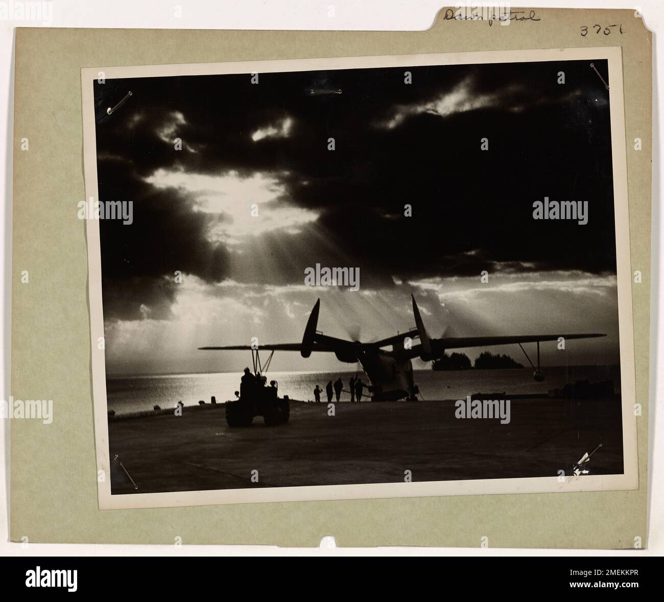 A U.S. Coast Guard air-sea rescue plane departs for a dawn patrol over ...