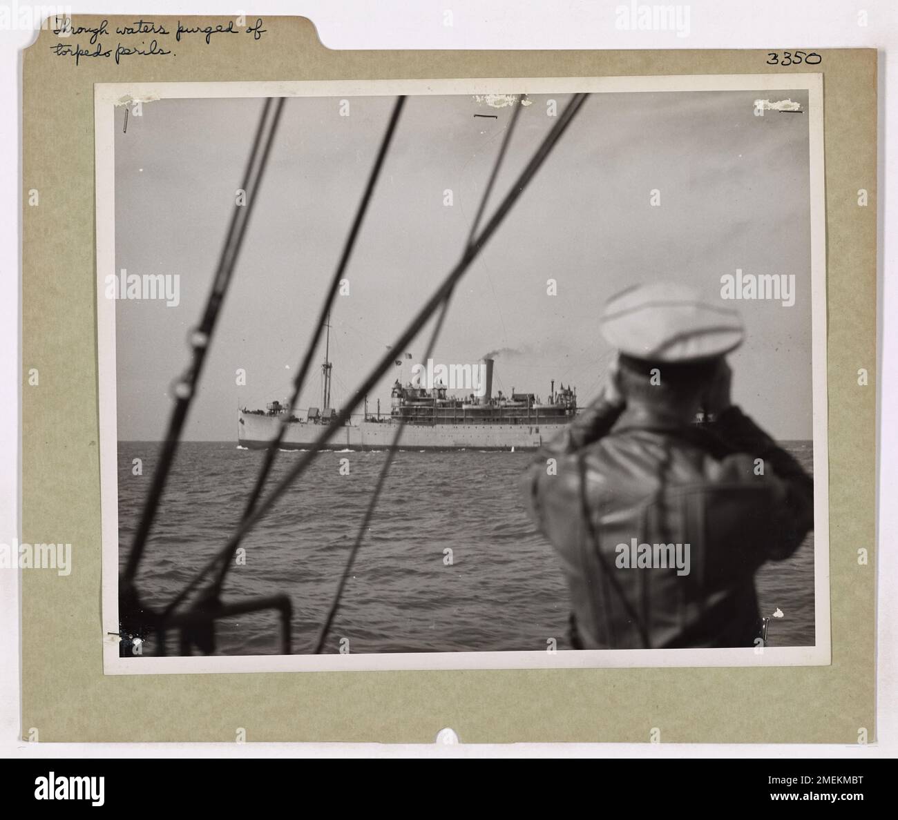 An American convoy, shielded by U.S. Coast Guard combat cutters, sails ...
