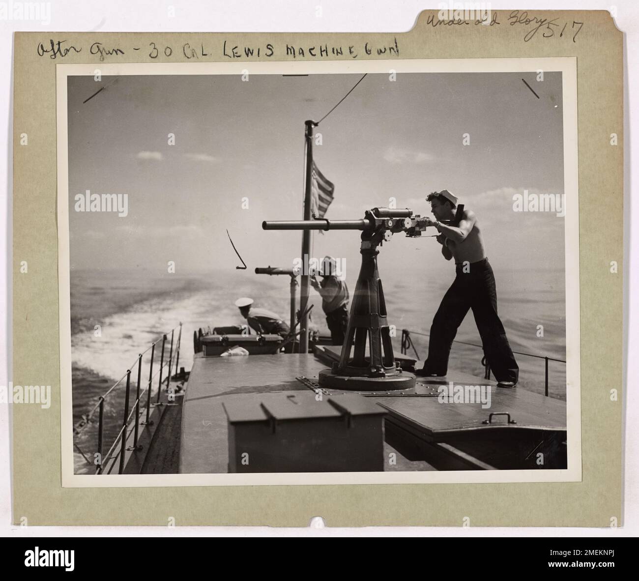 U.S. Coast Guardsmen are seen manning their guns under the American ...