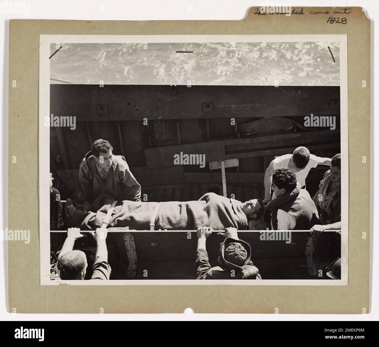 The Wounded Come Out. An American invader, wounded in a beachhead ...