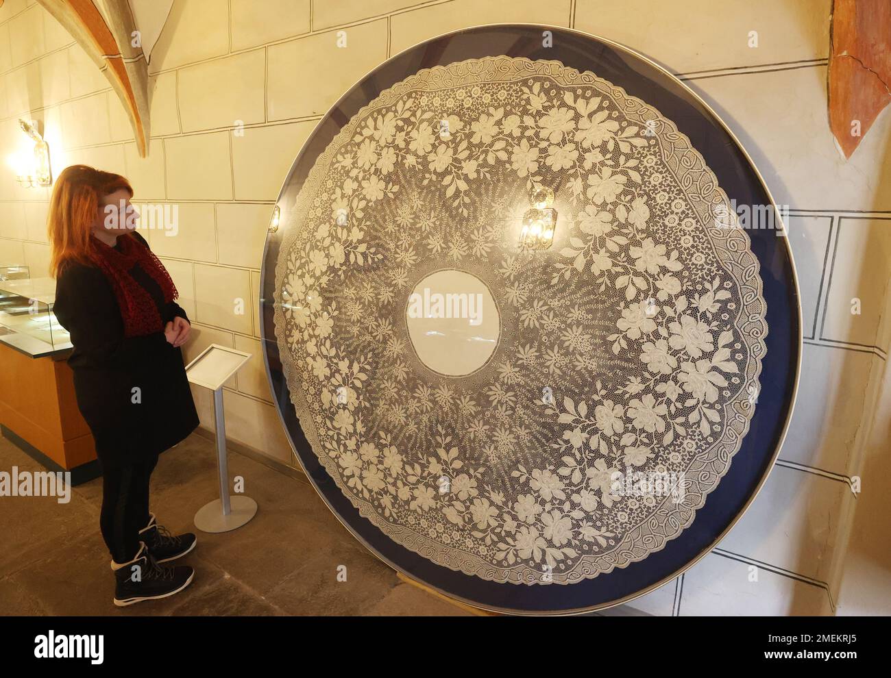 Plauen, Germany. 24th Jan, 2023. An employee looks at a 1930 wraparound ...