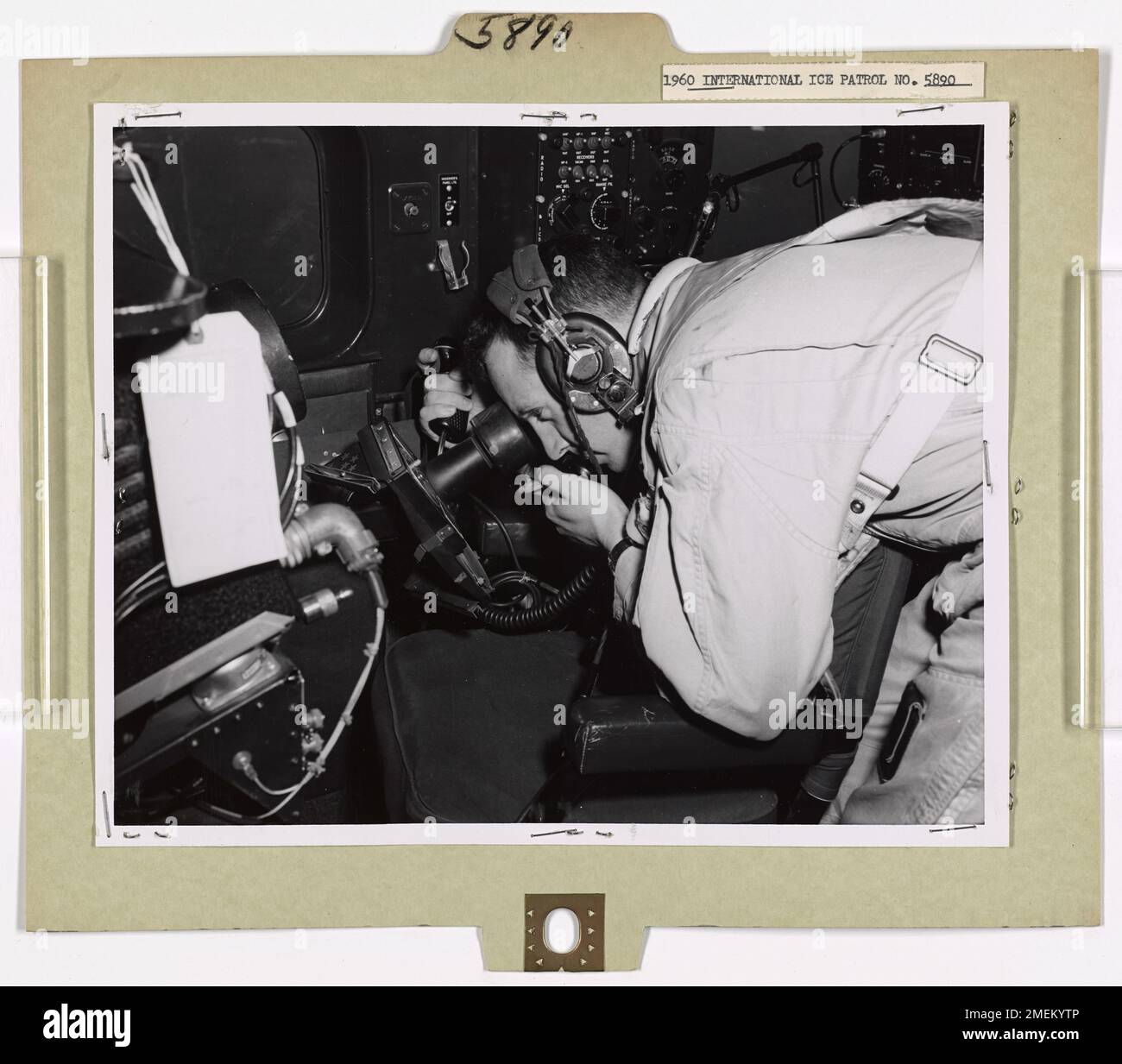 Sighting Iceberg Target. Lieutenant (jg) Thomas F. Budinger, USCGR ...