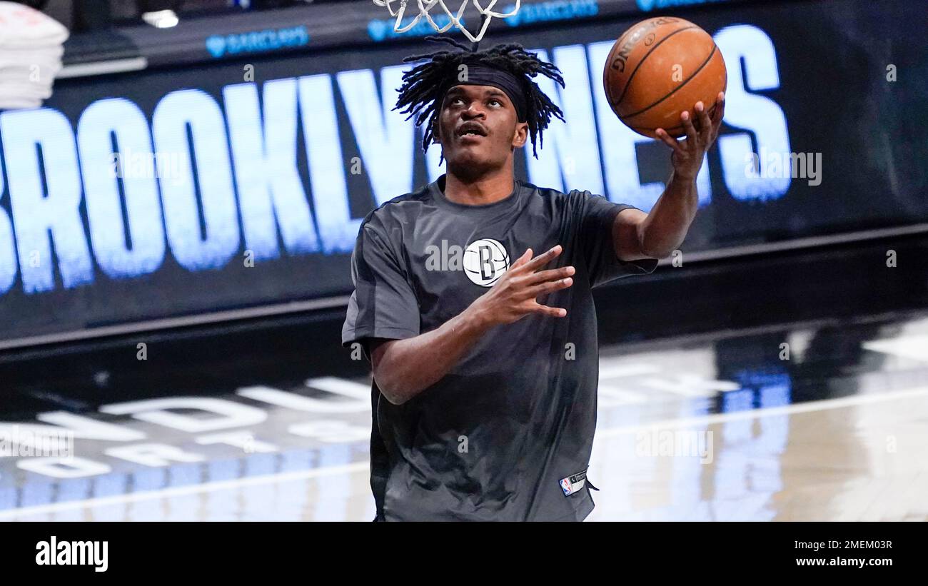 Brooklyn Nets forward Alize Johnson warms up before the start of an NBA ...