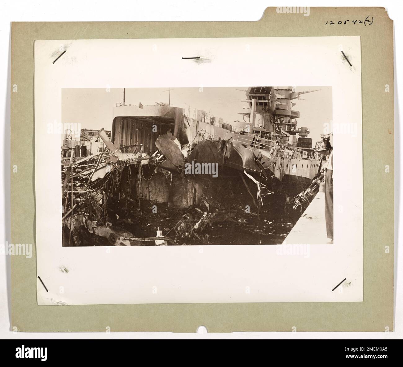 This image depicts the aftermath of a shipwreck at Oran, a coastal city ...