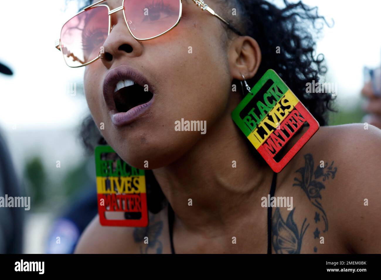 Lydia Robinson, 31, of Raleigh, N.C., speaks as demonstrators protest ...