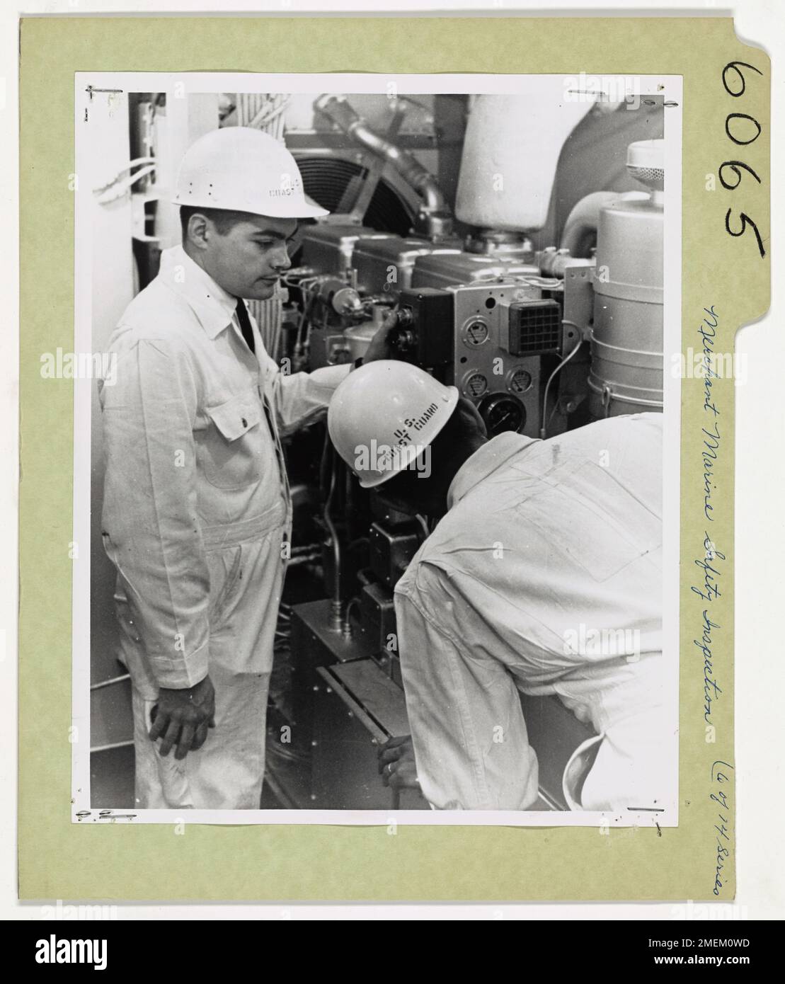 U.S. Coast Guard marine inspectors Lieutenant Paul M. Hureau and ...