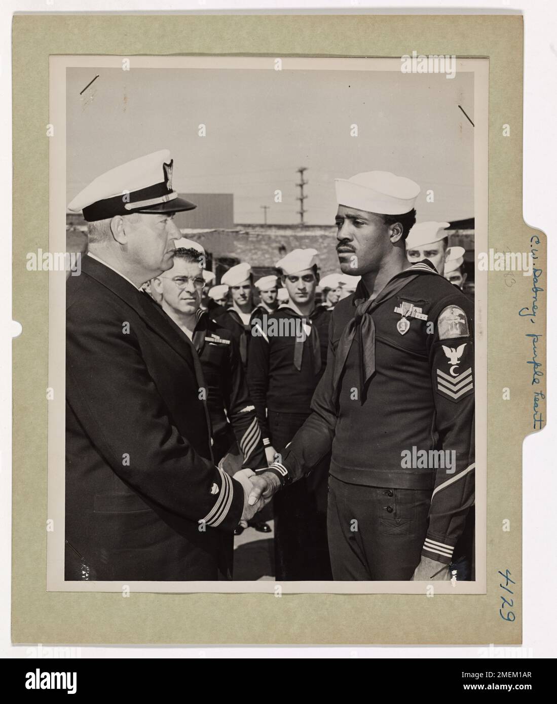 Photograph of Coast Guardsman Clarence W. Dabney Being Presented the ...