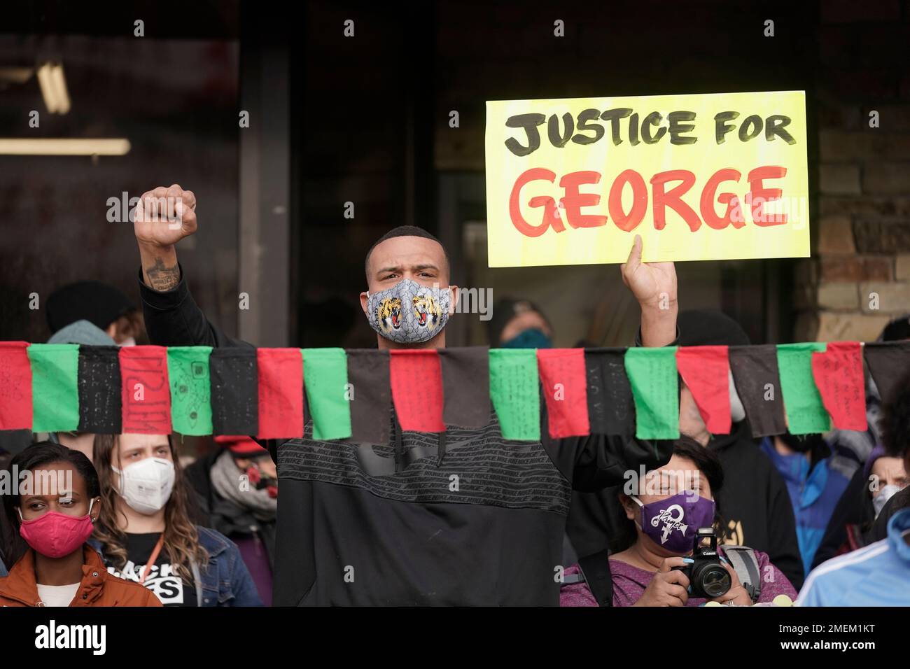 People celebrate outside Cup Foods in Minneapolis, Tuesday, April 20 ...
