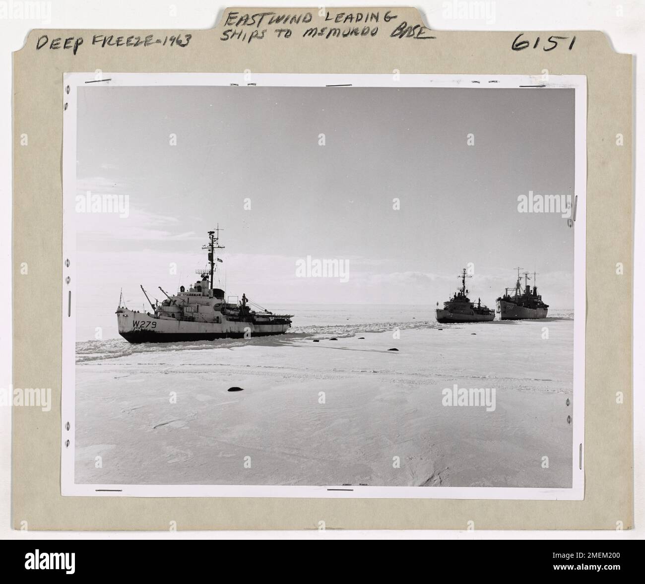 The U.S. Coast Guard icebreaker Eastwind leads a convoy of ships ...