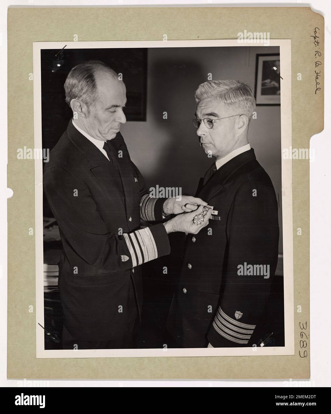 Vice Admiral Russell R. Waesche presents the Legion of Merit to Capt ...