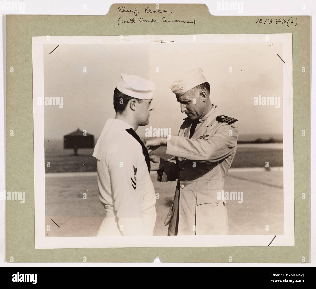 Coast Guardsman Edward J. Vance receives the Purple Heart after being ...