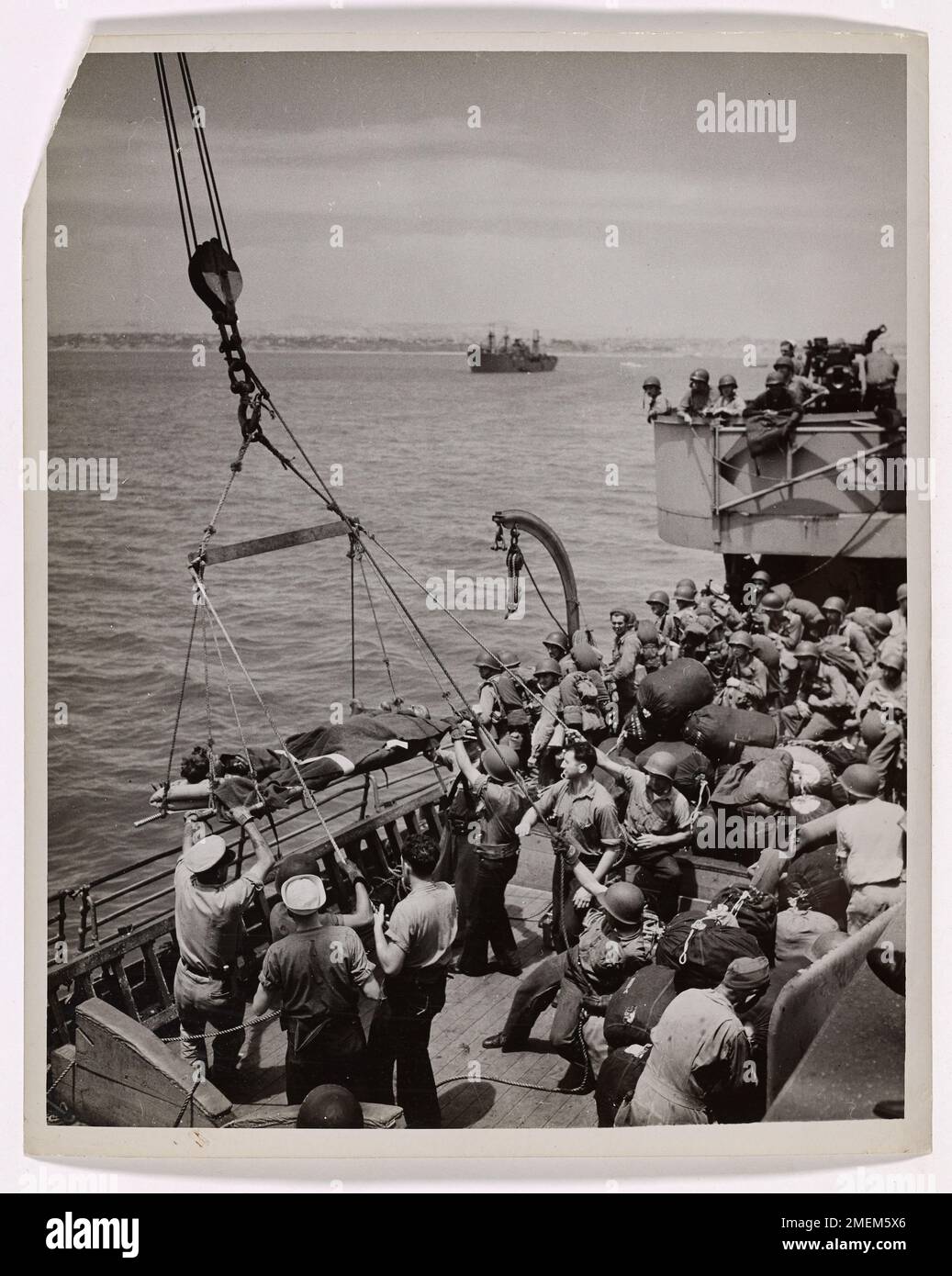 Wounded soldiers are being brought aboard a Coast Guard-manned ...
