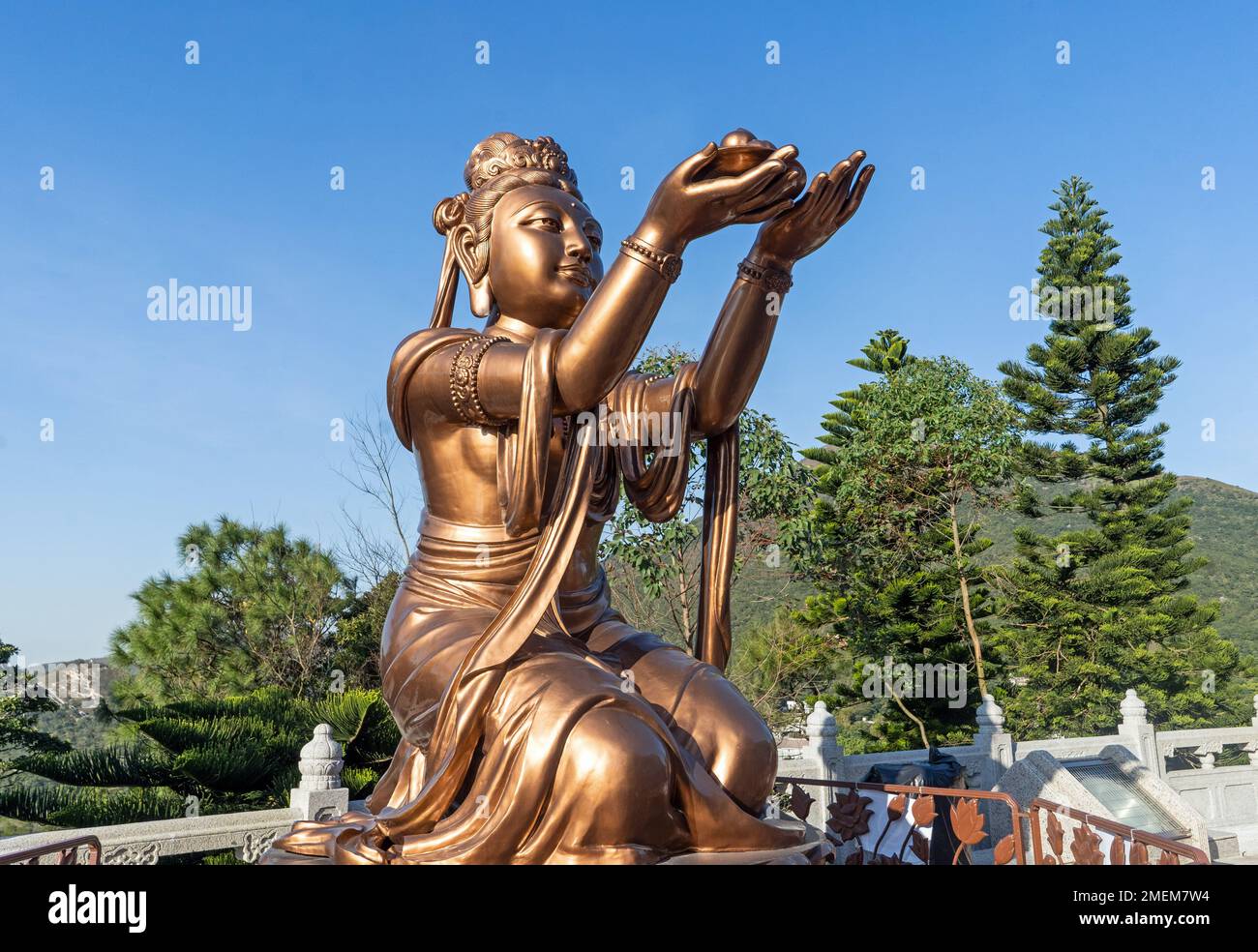 Hong Kong - December 2022 -Buddhist deities or Deva offering goods to ...