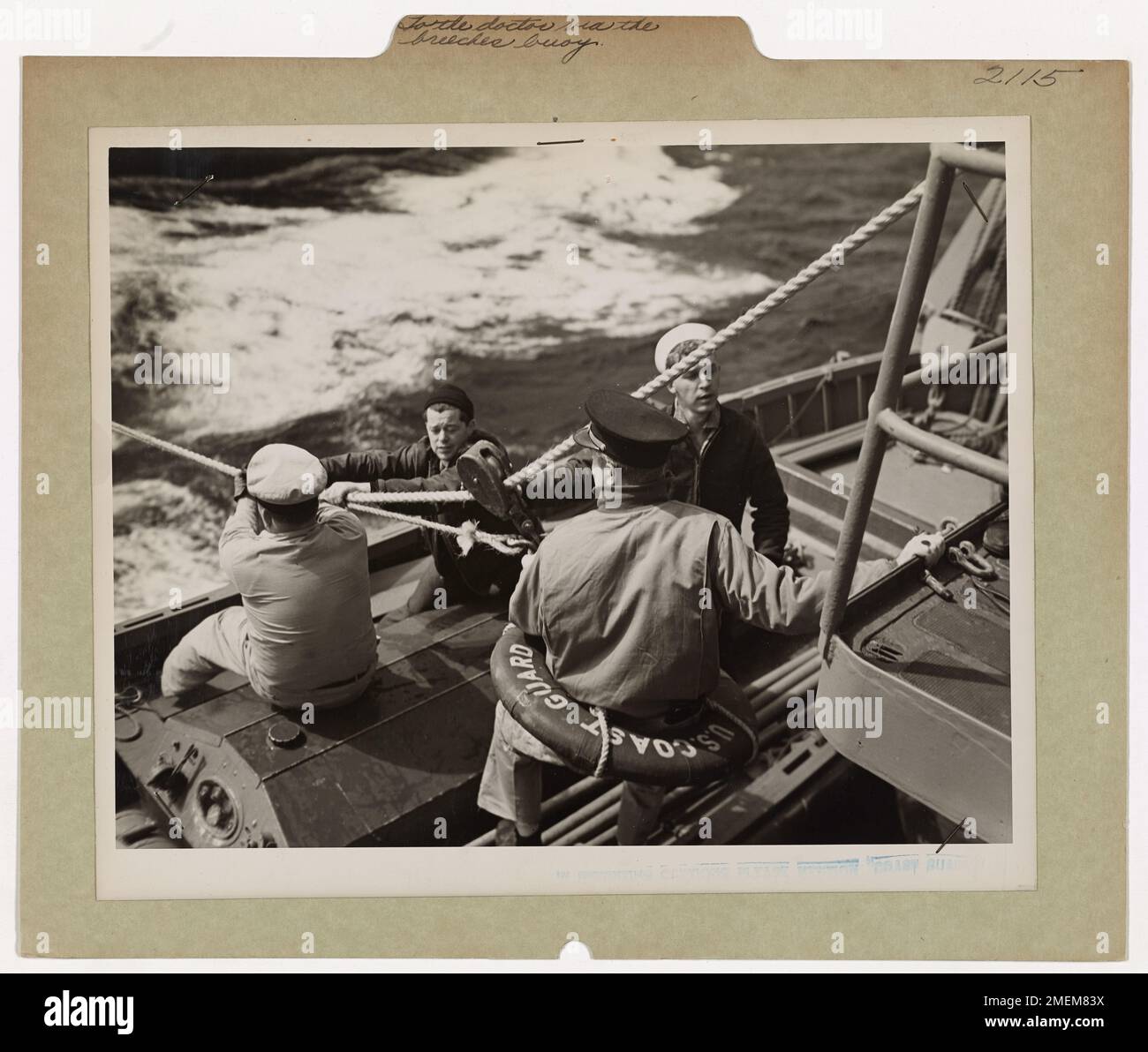 A sick seaman is transferred from his cargo vessel to a Coast Guard ...