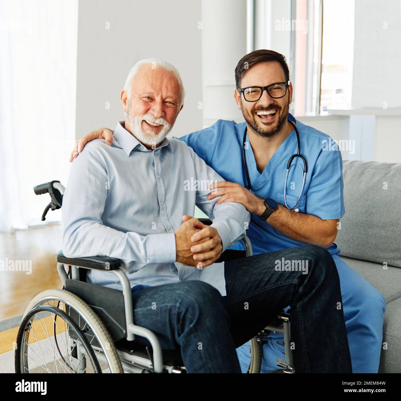 Nurse helping elderly male patient hi-res stock photography and images - Alamy