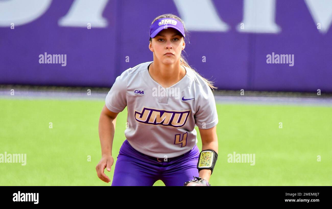 James Madison's Sara Jubas watches the batter and stays ready during an ...
