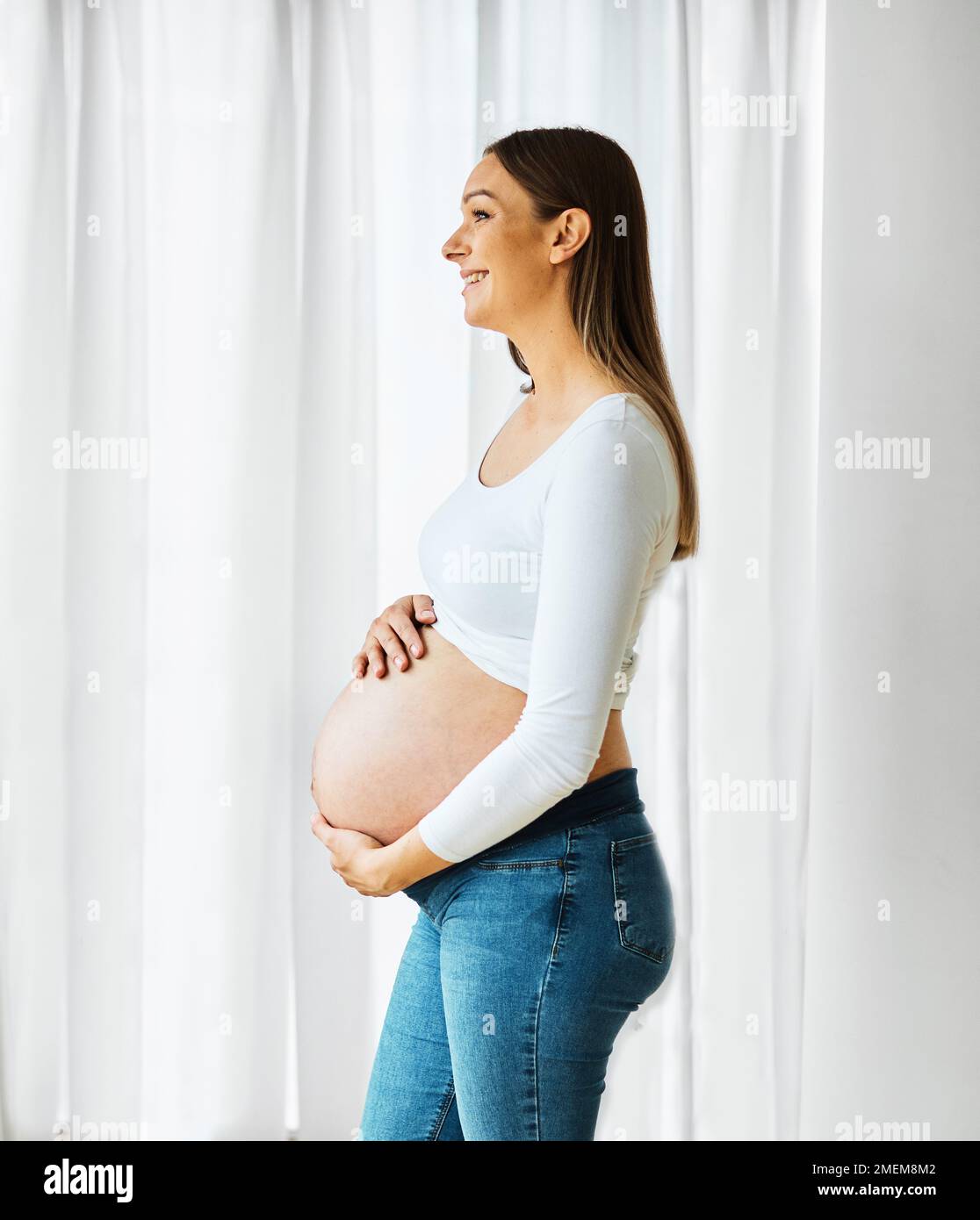 Beautiful female belly hi-res stock photography and images - Alamy