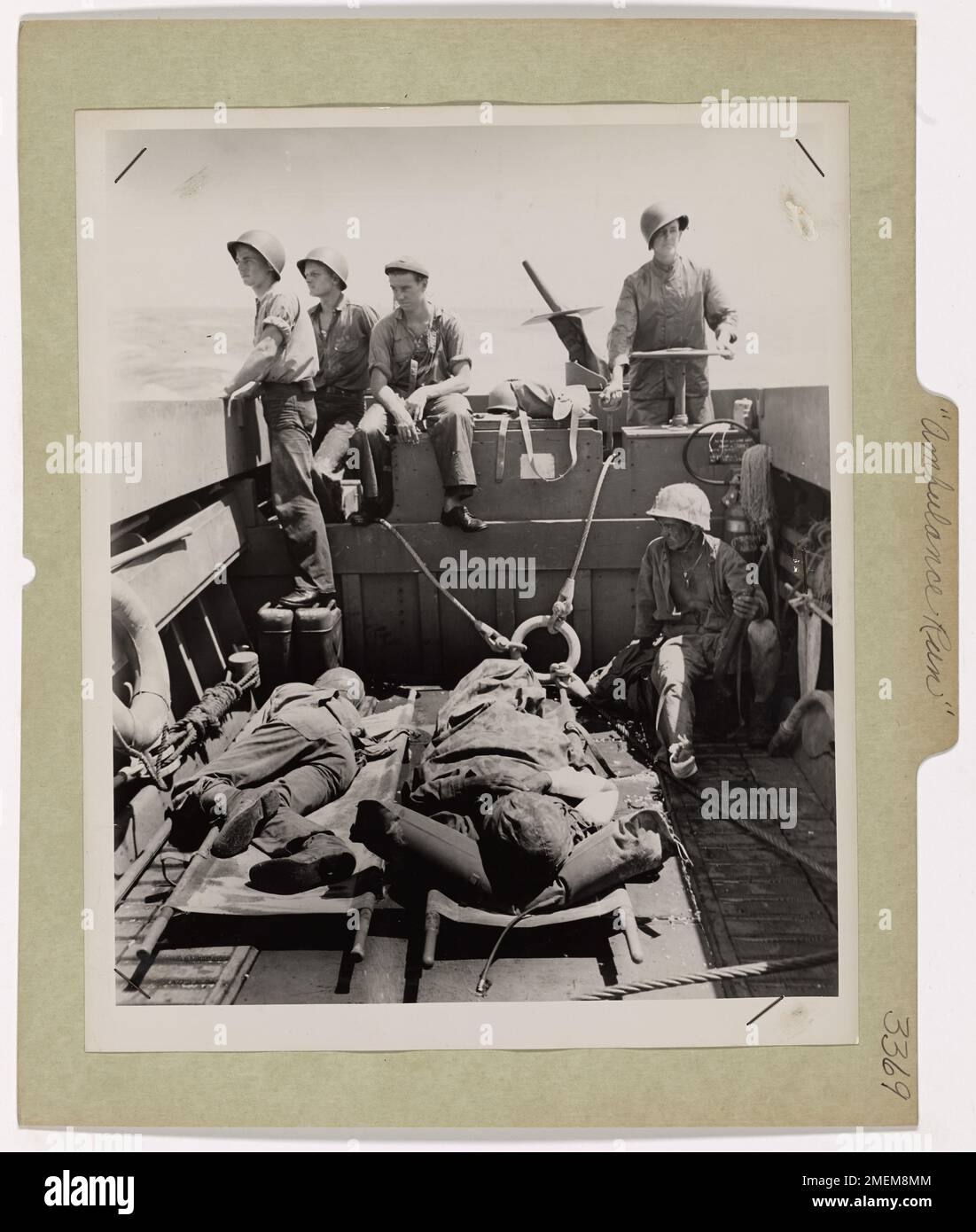 A Coast Guard coxswain rushes to evacuate wounded soldiers from ...