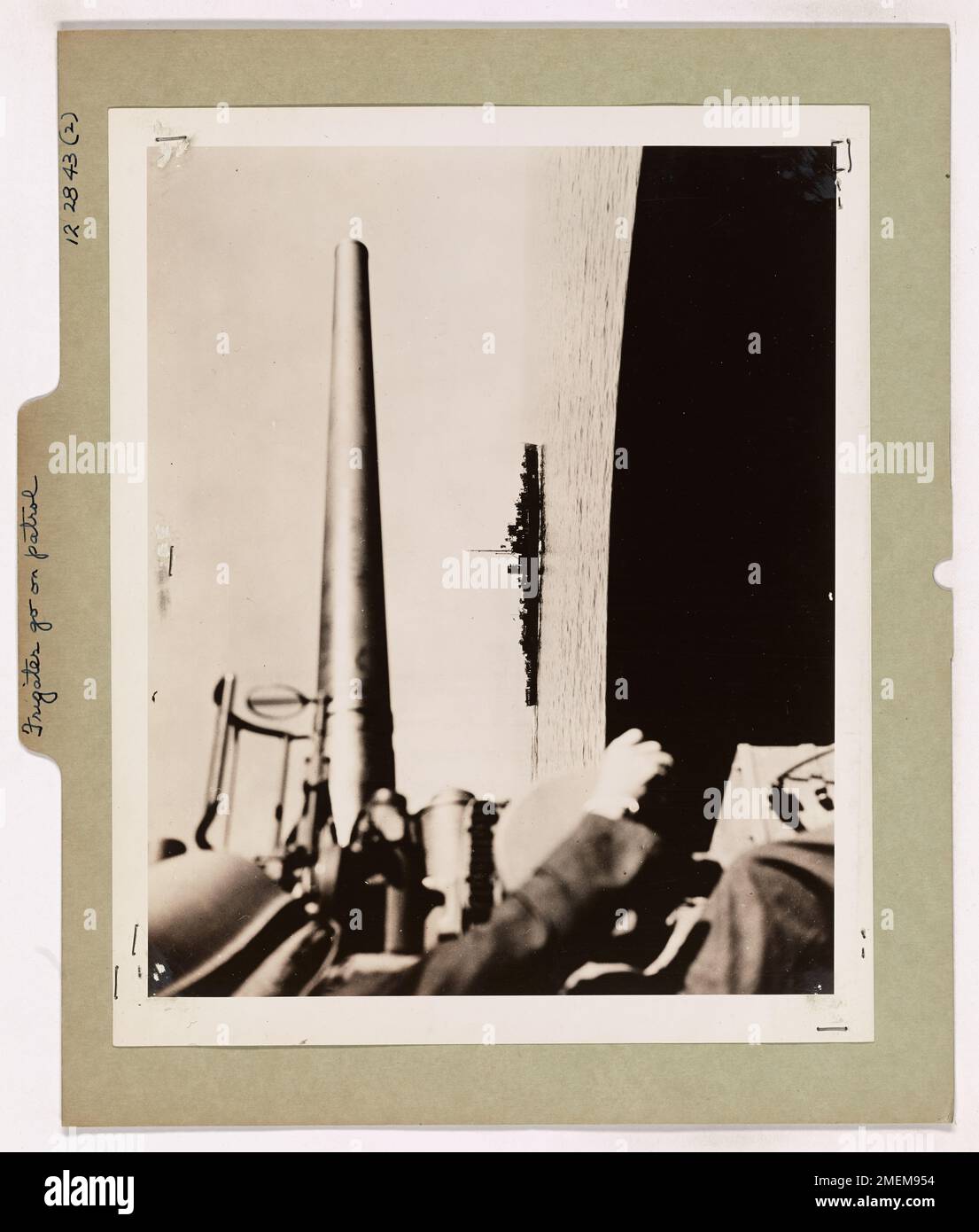 This image shows a U.S. Coast Guard-manned frigate passing its sister ...
